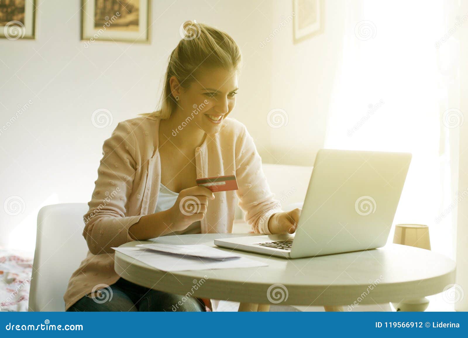 Cheerful Woman Paying Bills. Stock Photo - Image of electronic, home ...