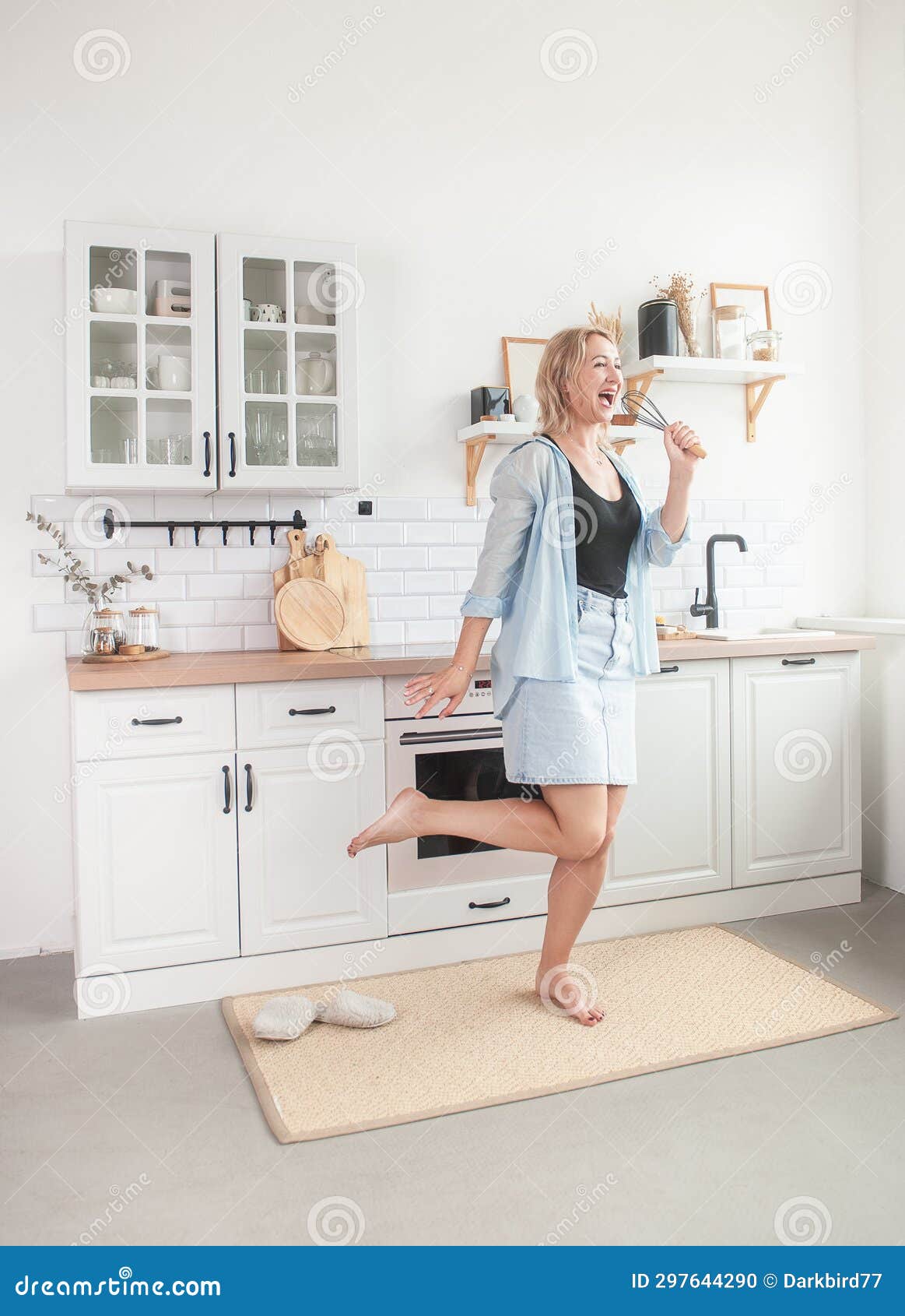 Cheerful Woman Singing with Whisk in the Kitchen Stock Photo - Image of ...