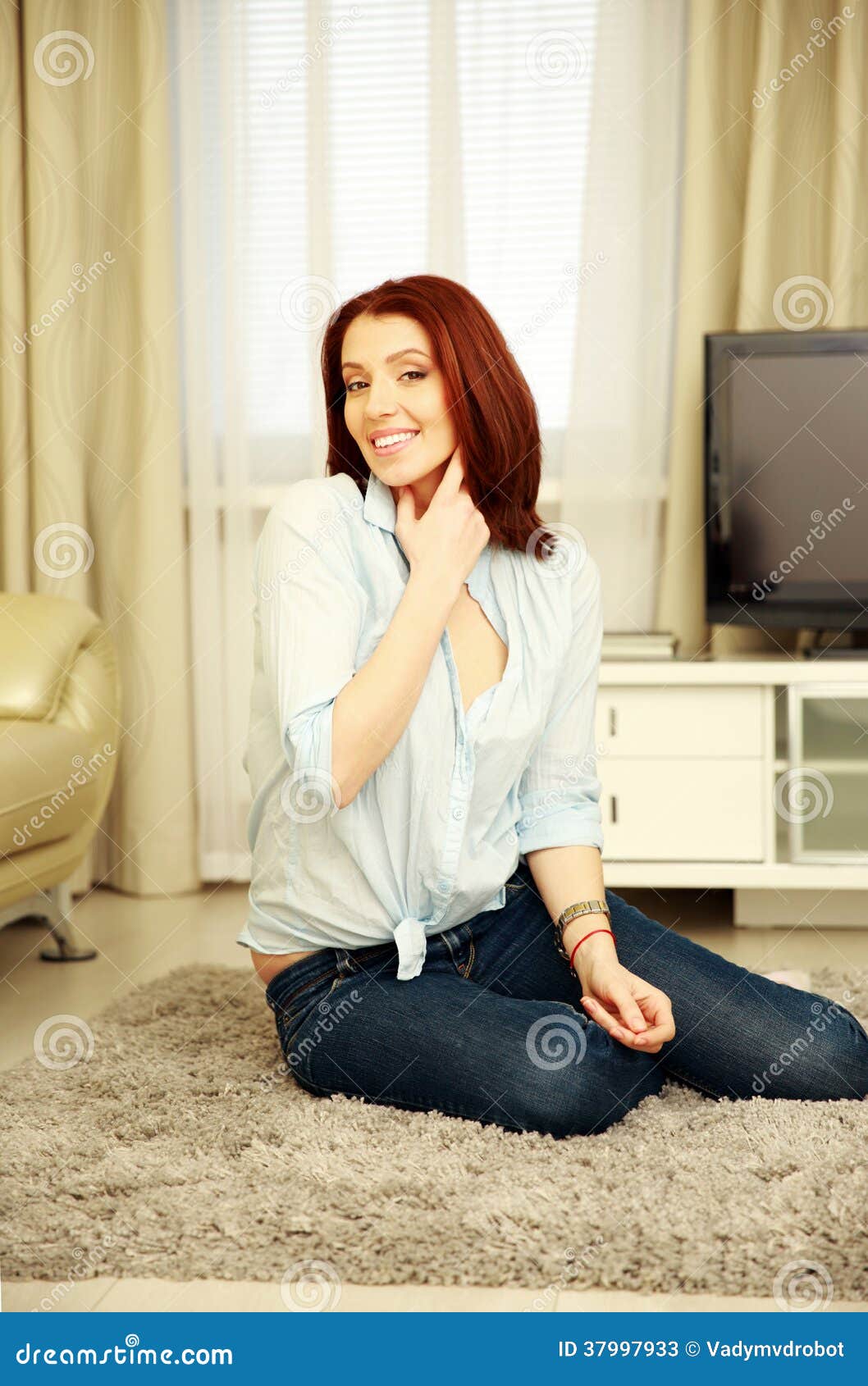 Cheerful Woman Sitting on the Carpet Stock Image - Image of indoors ...