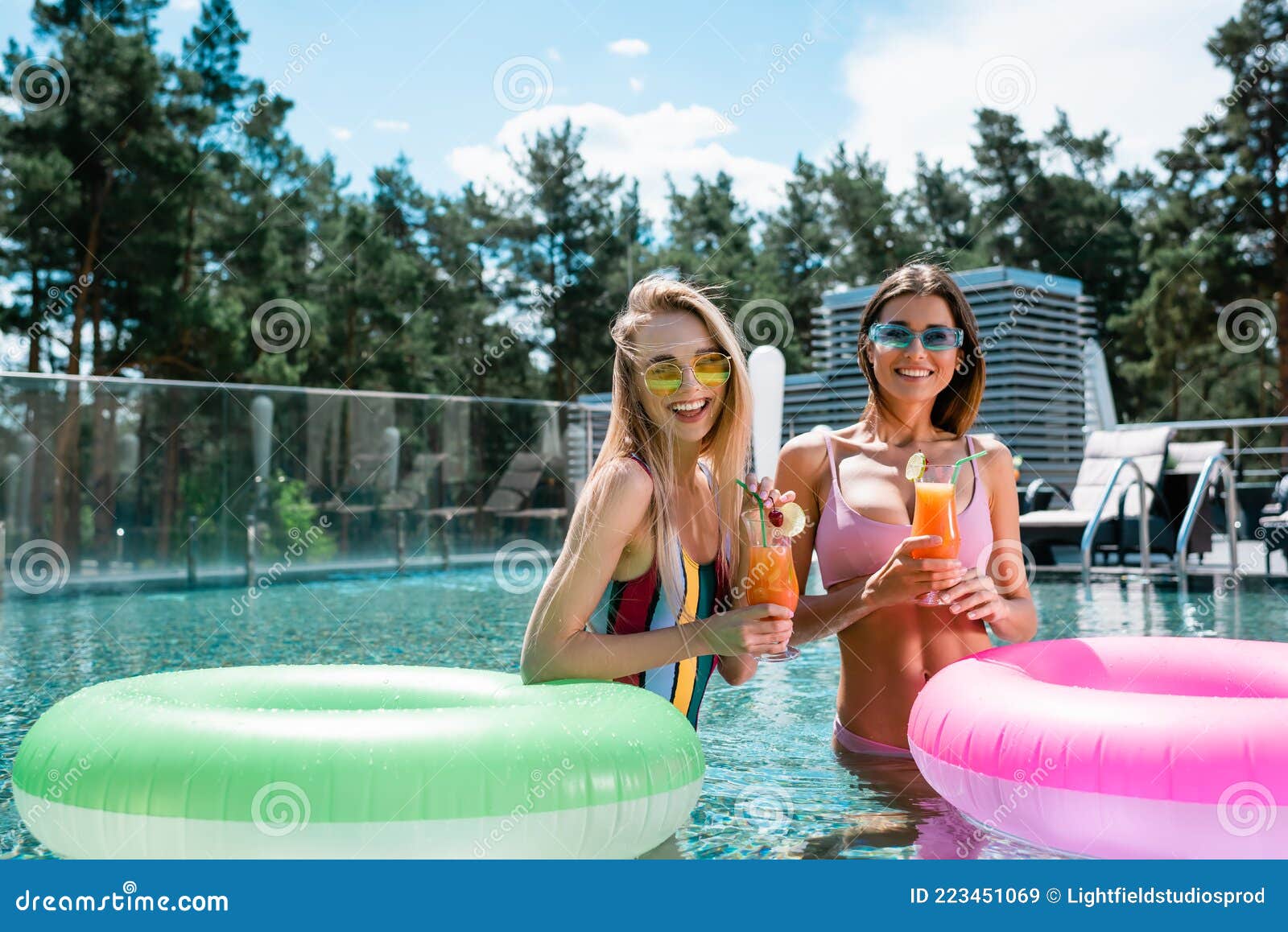 Cheerful Women Holding Cocktails Near Swim Stock Image Image Of