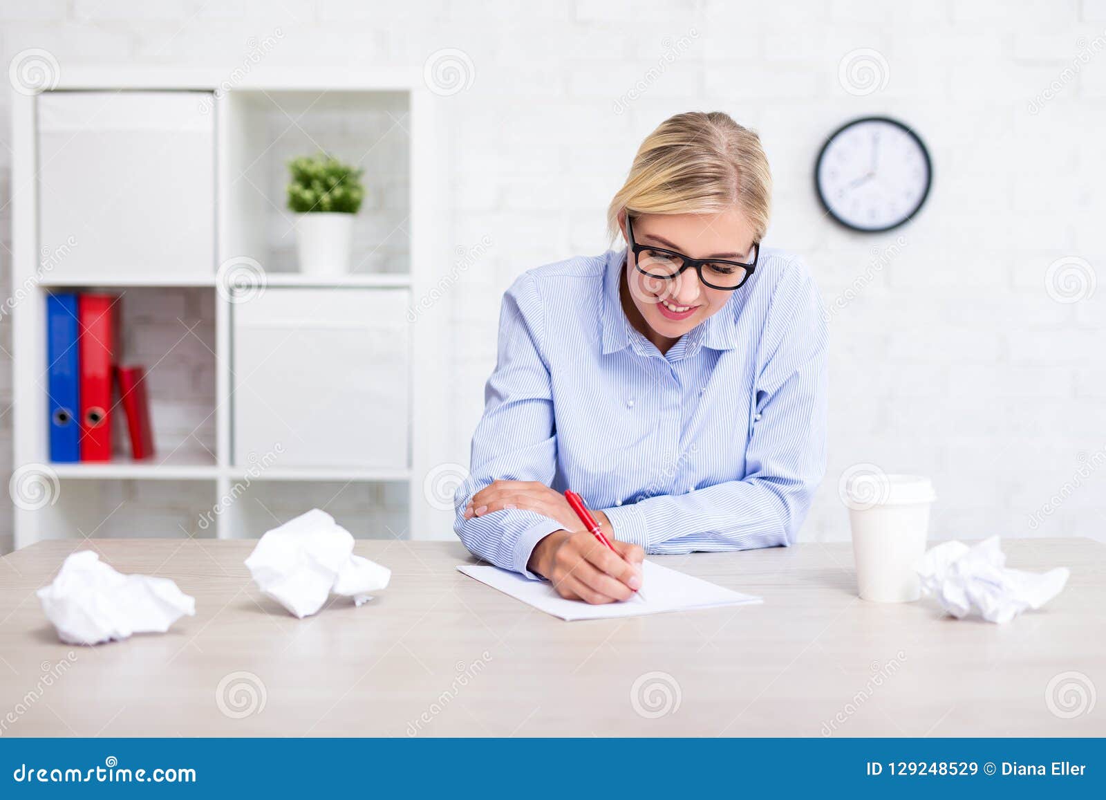 Cheerful Young Beautiful Woman Writing Something Stock Image - Image of ...