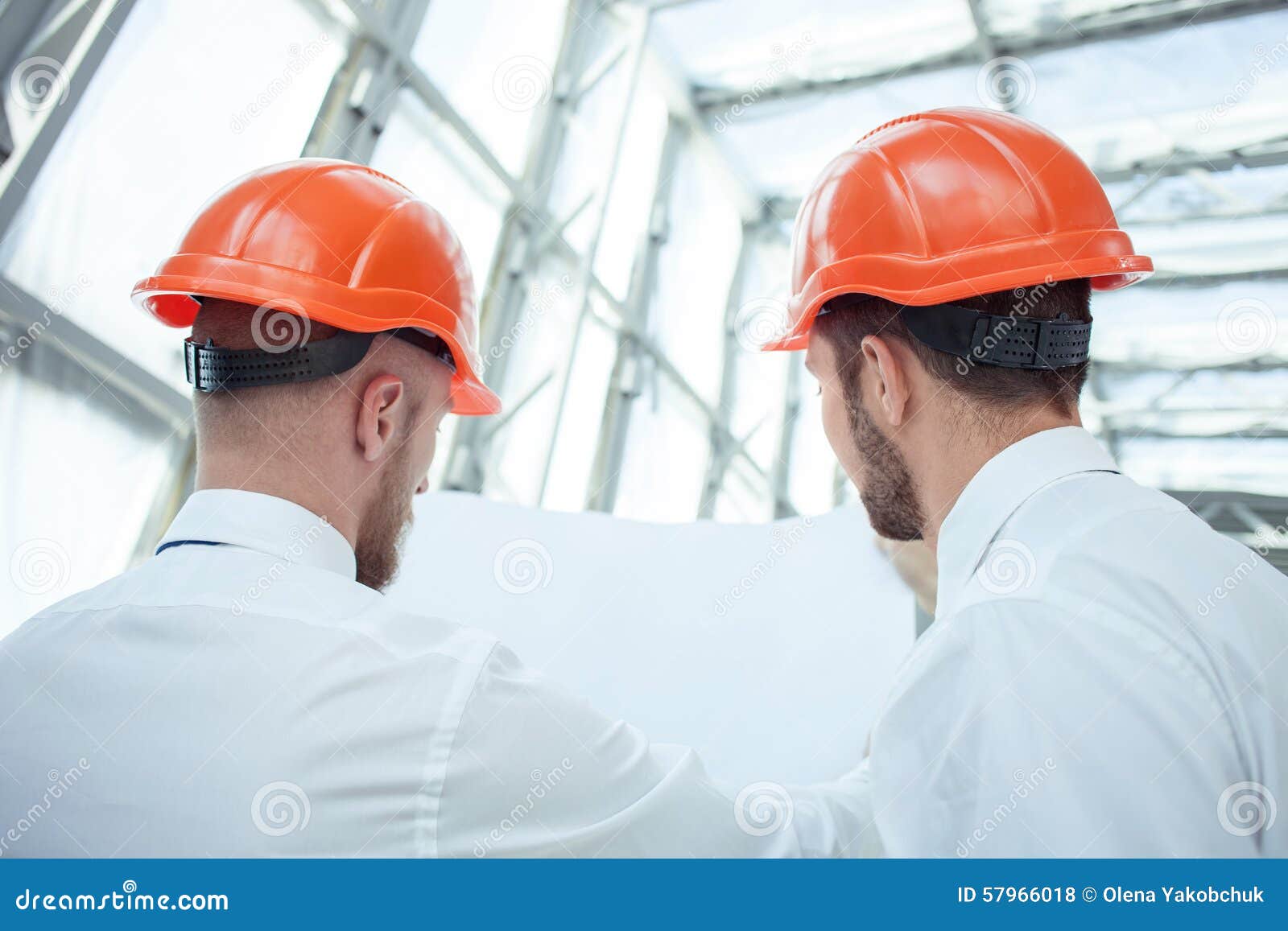 Cheerful Young Builders are Working on Plan of Stock Photo - Image of ...
