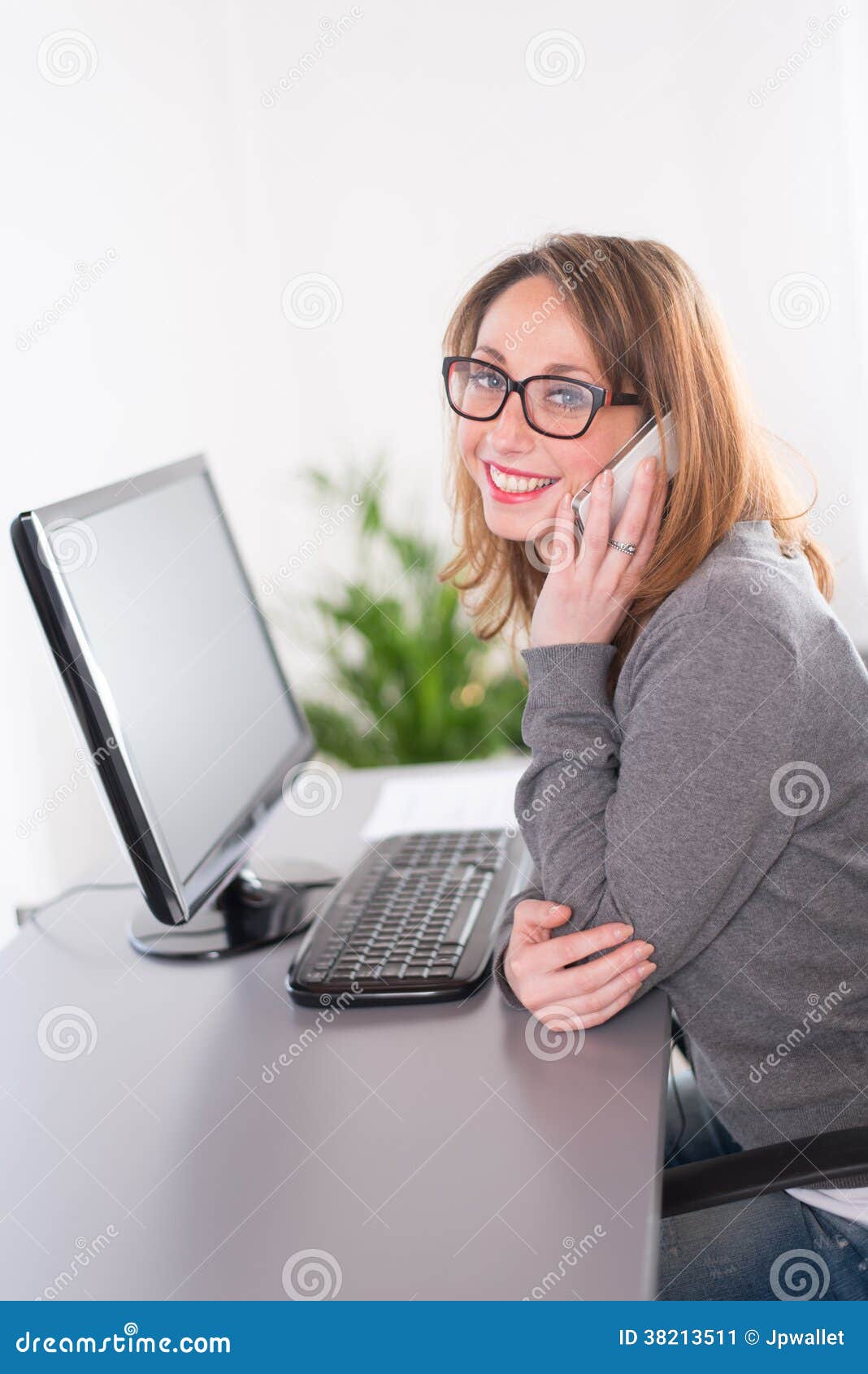 Cheerful Young Business Woman with Glasses Working with Computer Stock ...