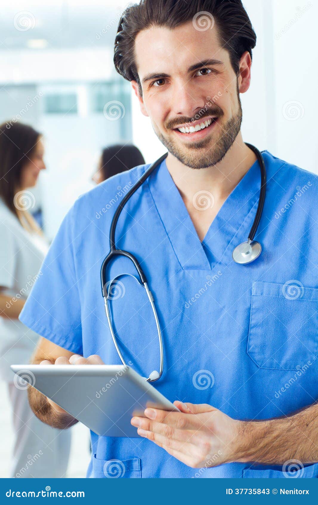 Cheerful Young Doctor Looking at the Camera Stock Image - Image of ...