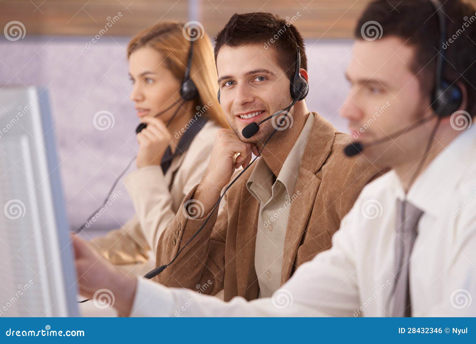 Cheerful Young Male Dispatcher Working Stock Photo - Image of computer ...