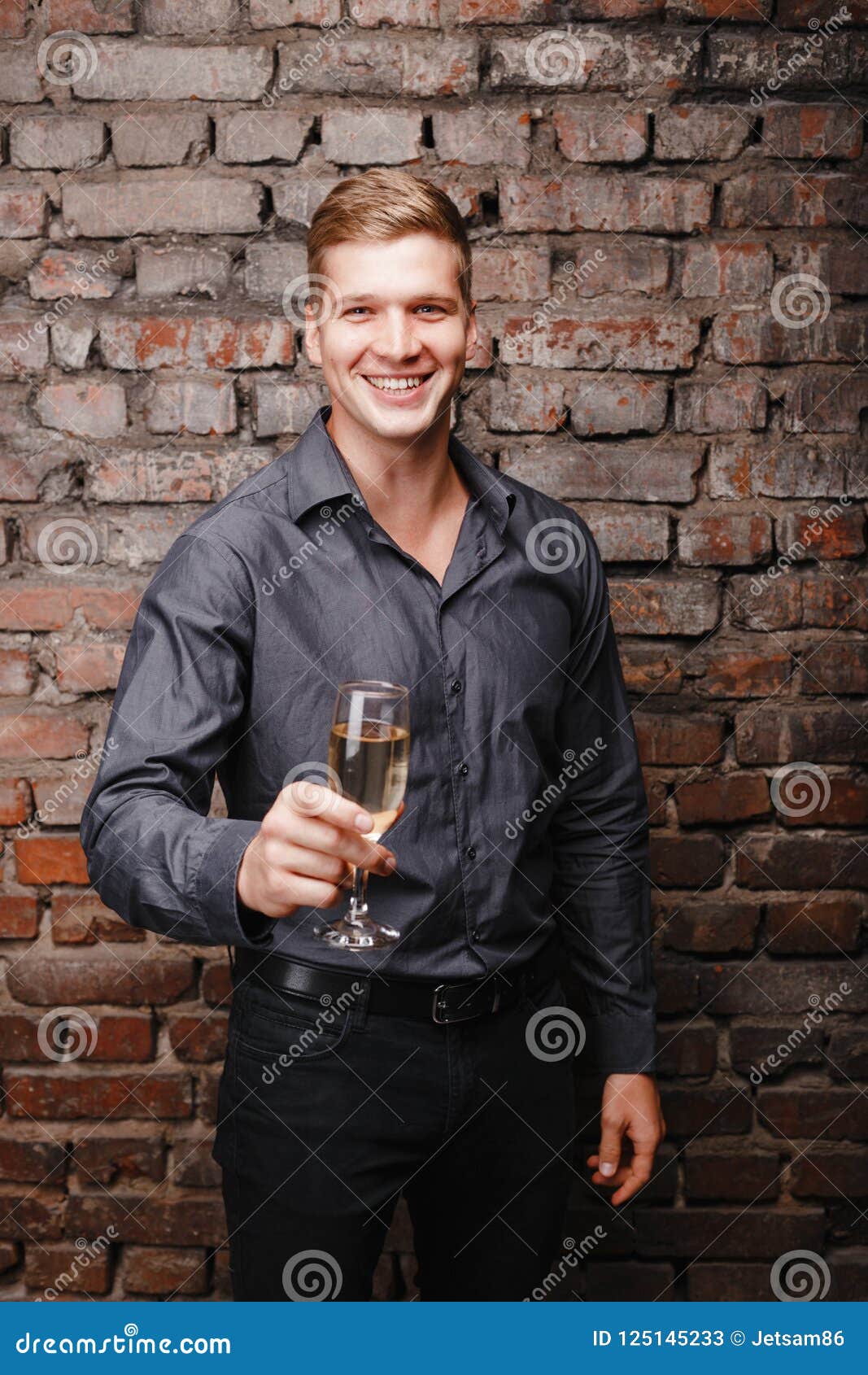 Cheerful Young Man Celebrating Drinking Champagne Stock Image Image