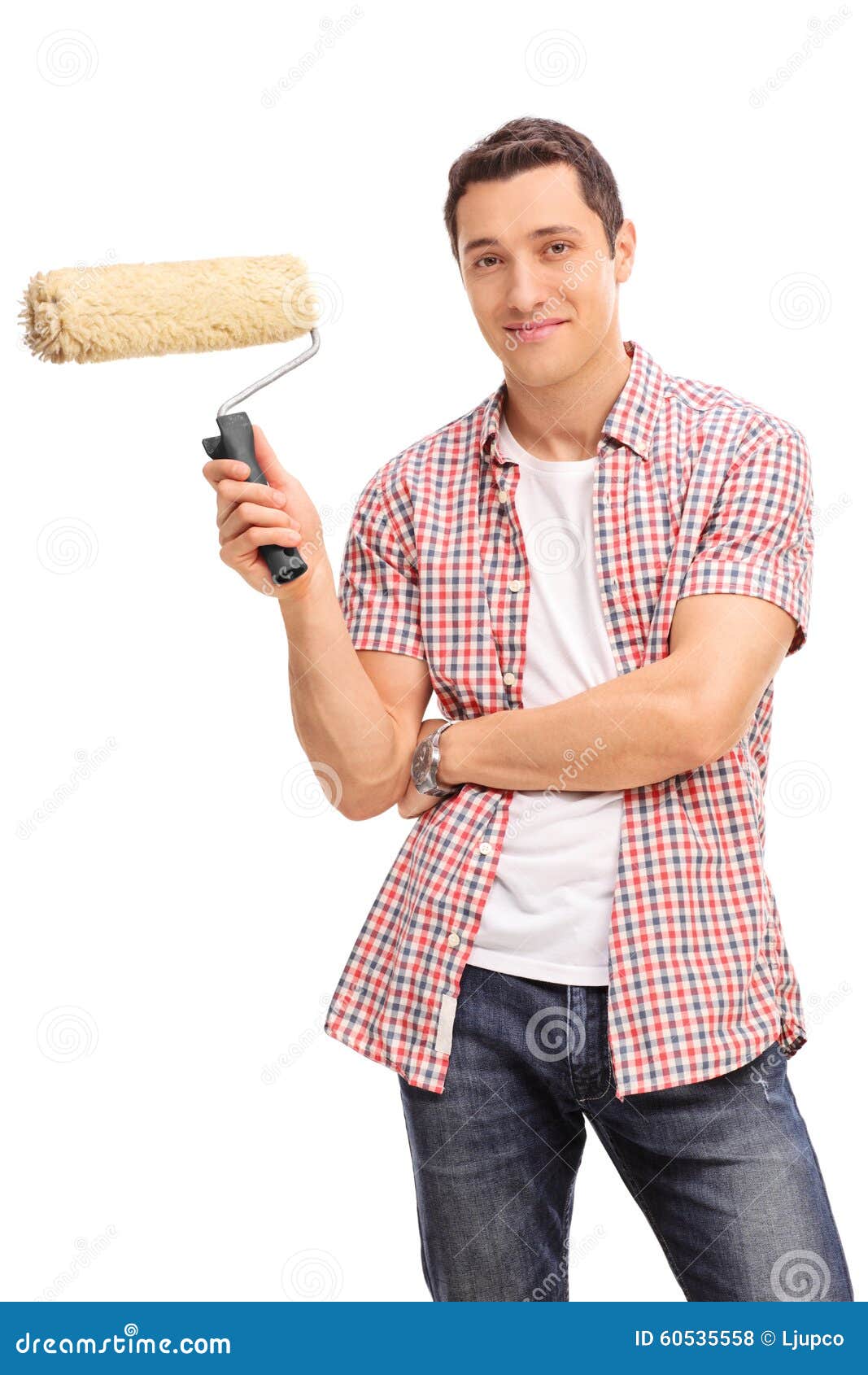 Cheerful Young Man Holding a Paint Roller Stock Photo - Image of ...
