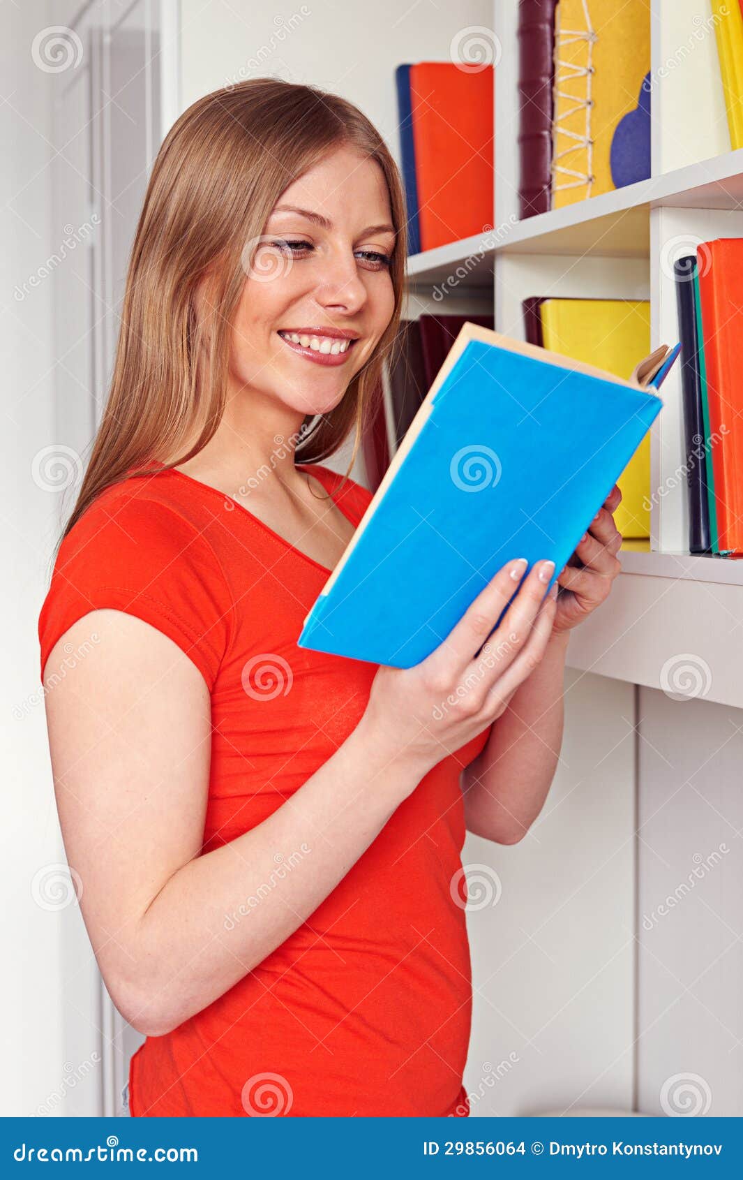 Woman Reading the Book and Smiling Stock Photo - Image of cute, woman ...