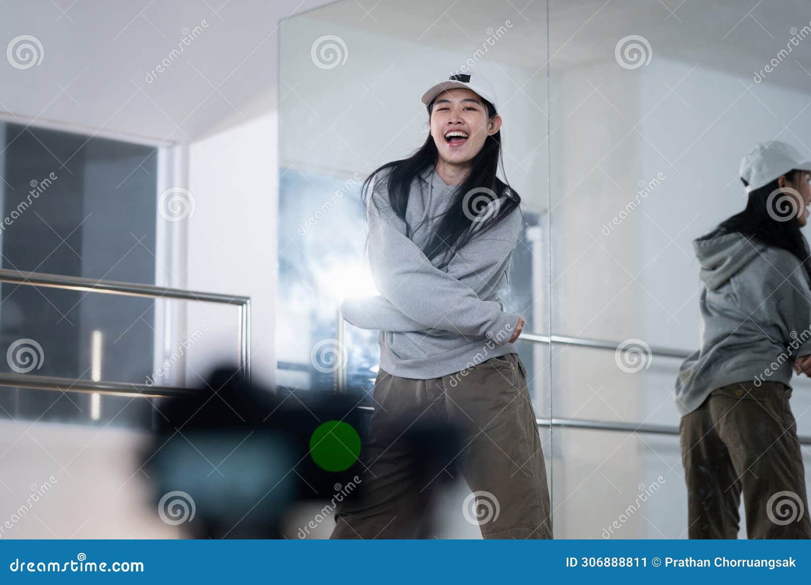 Cheerful Young Woman Recording Dance Video Tutorial for Social Media in ...