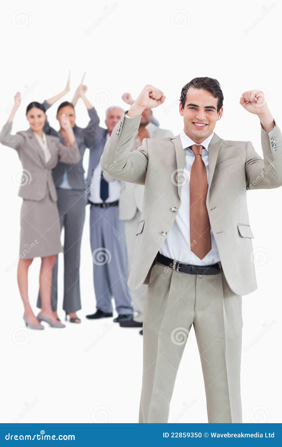 Cheering Businessman with Team Behind Him Stock Photo - Image of ...