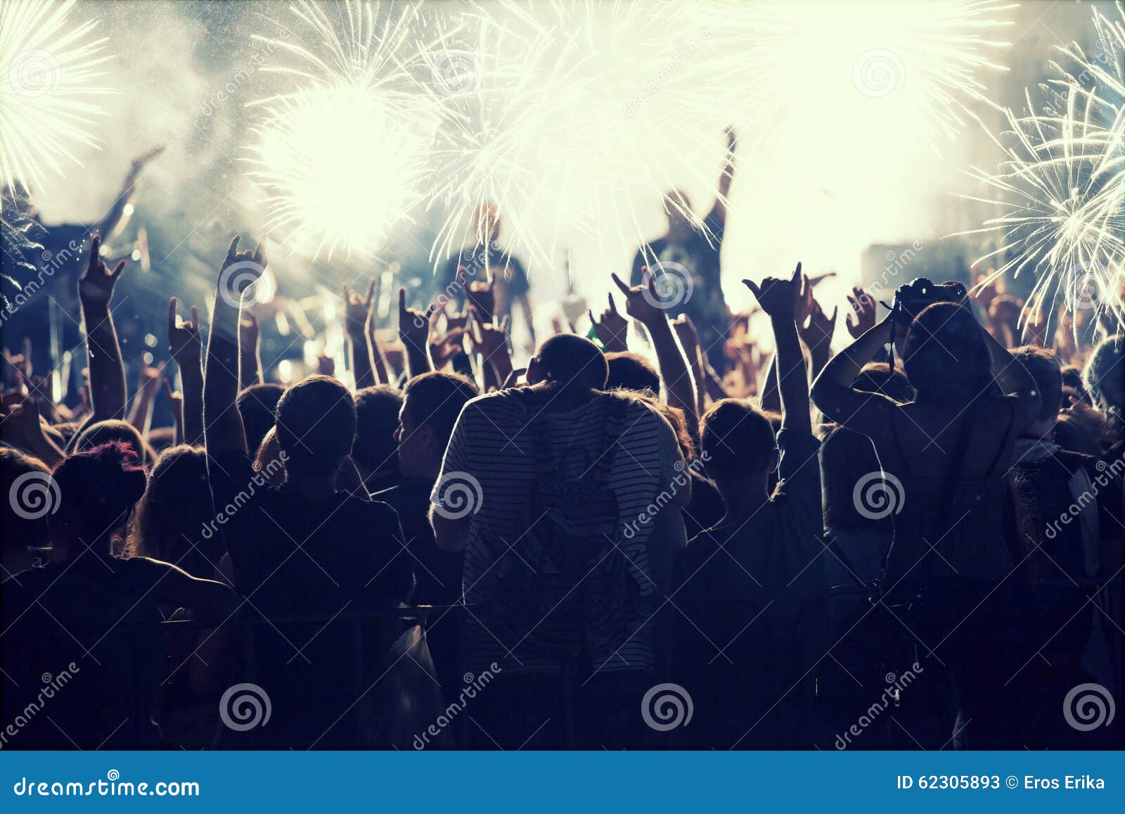 Cheering crowd at concert stock image. Image of cheerful - 62305893