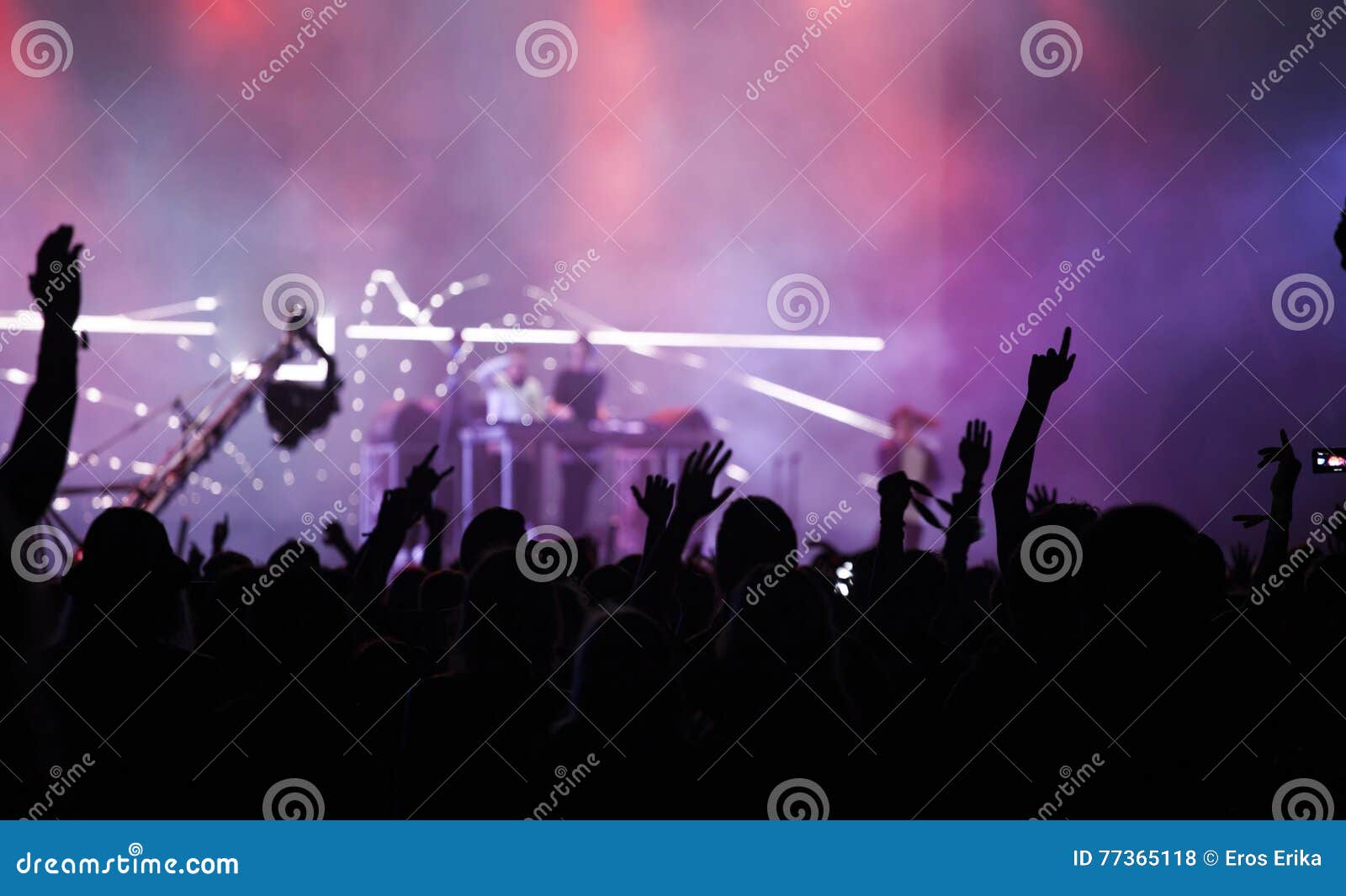Cheering Crowd in Front of Stage Lights Stock Photo - Image of ...