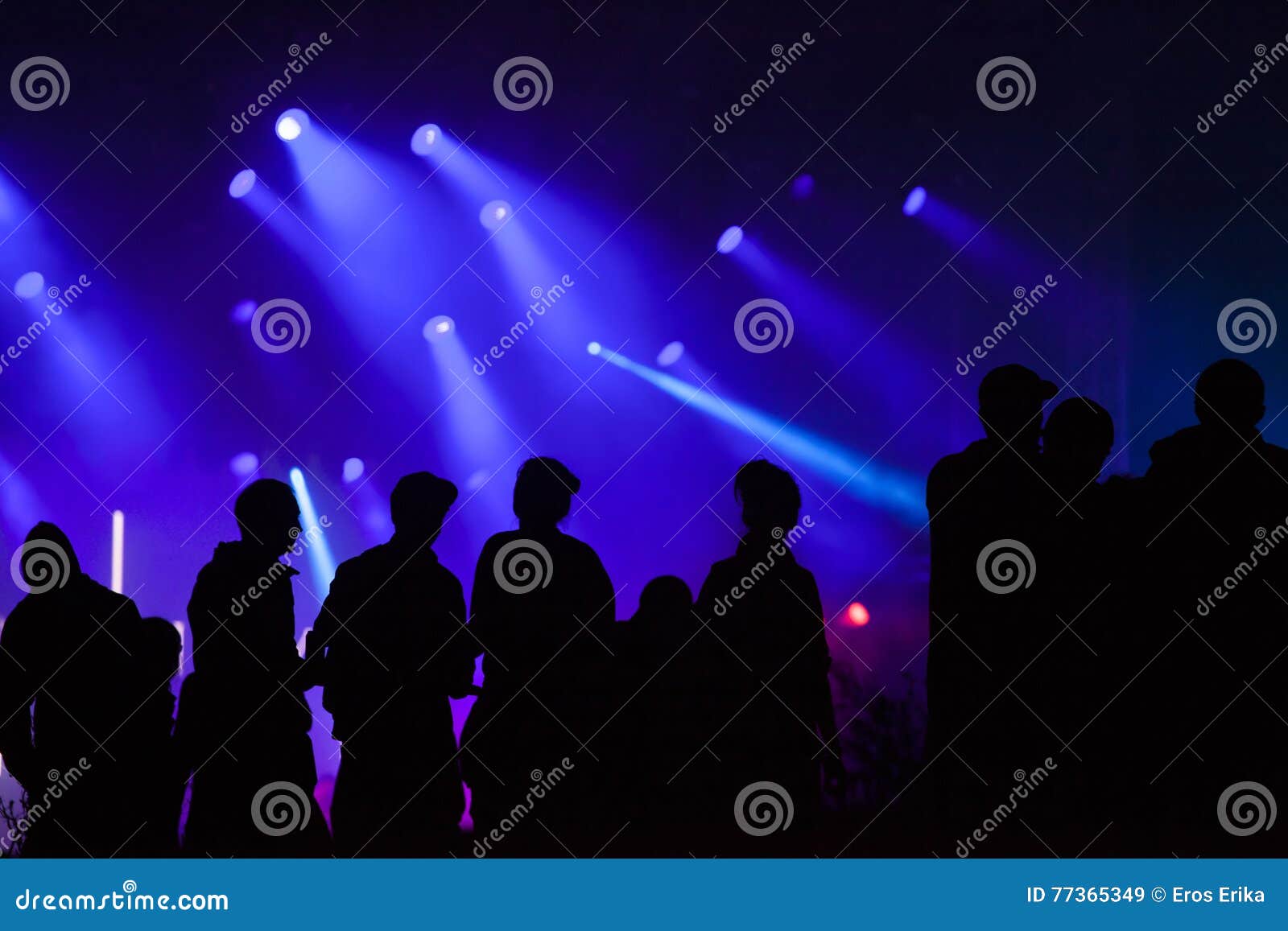 Cheering Crowd in Front of Stage Lights Stock Image - Image of popular ...