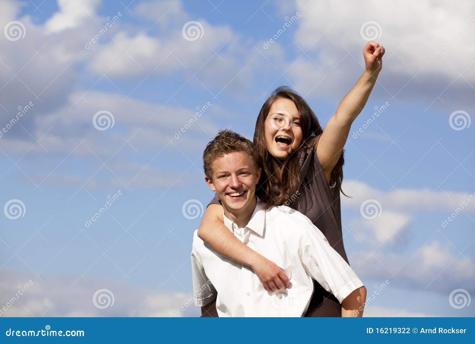 Cheering Happy Teenage Couple Stock Photo - Image of friendship ...