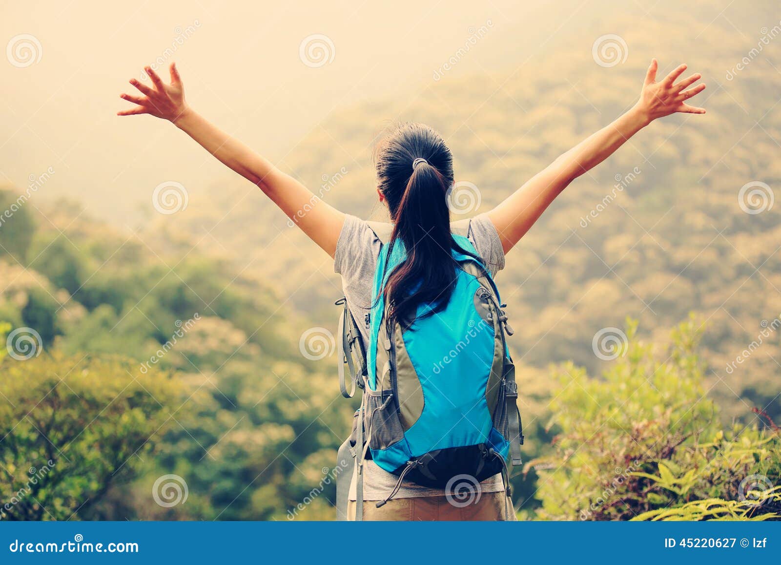 Cheering woman hiker stock image. Image of harmony, backpack - 45220627