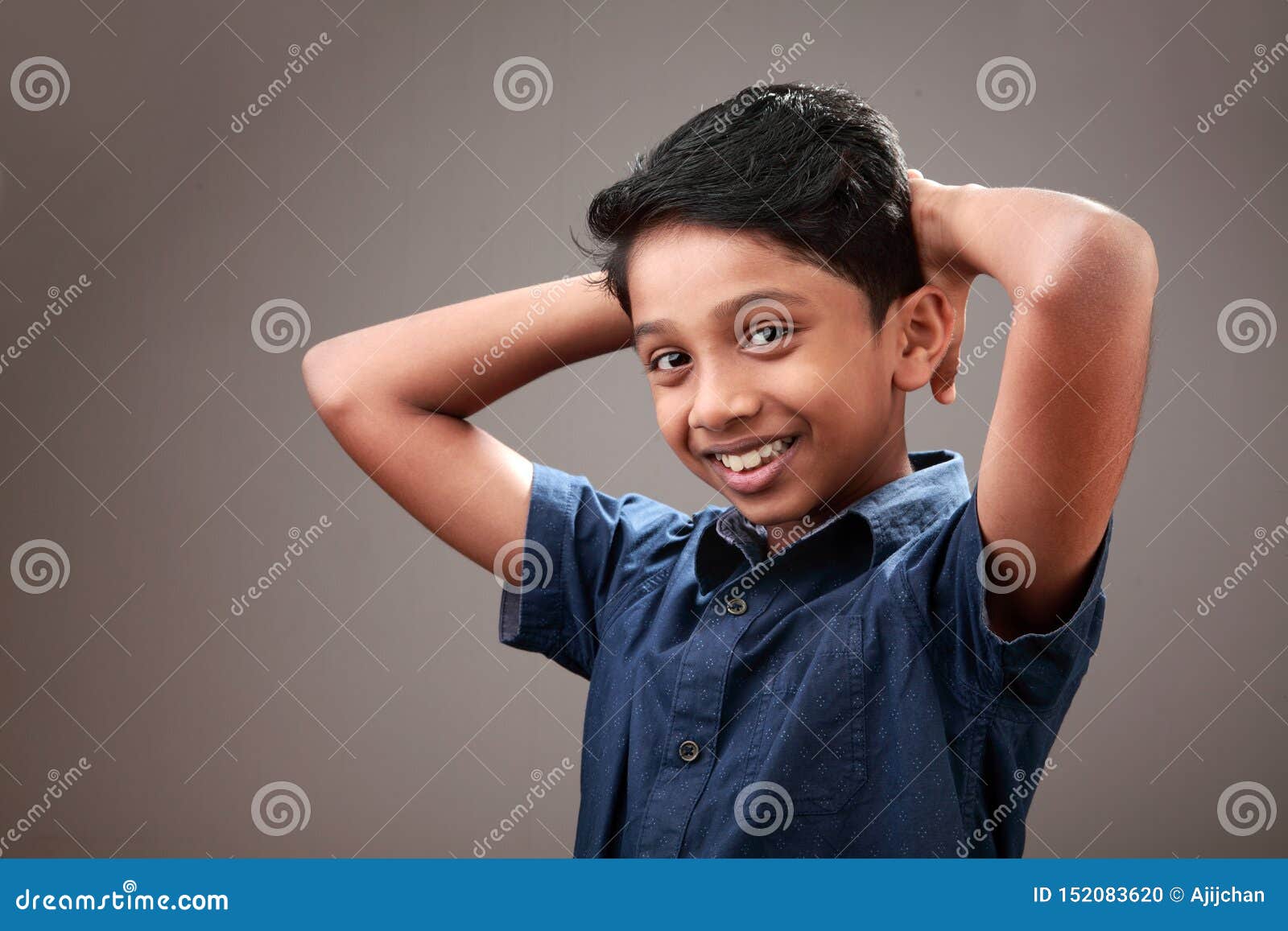 A cheering young boy stock photo. Image of laughing - 152083620