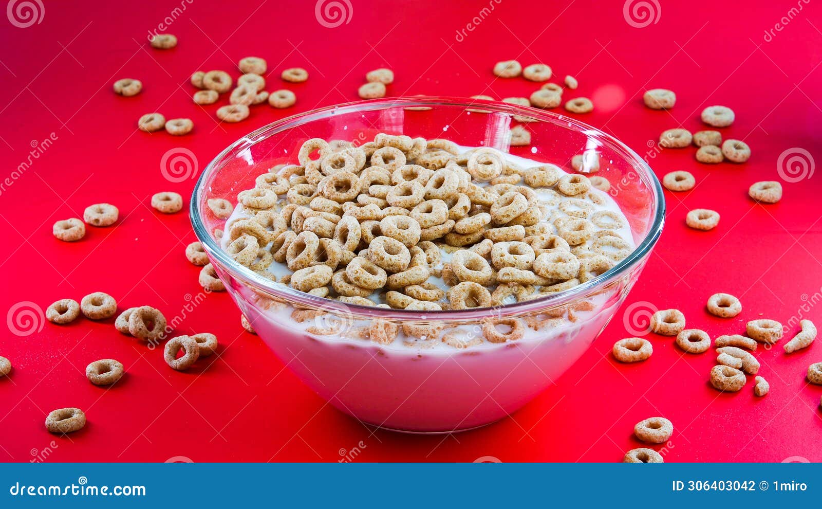 Cheerios in Bowl with Milk on Red Background and Cheerios Around Stock ...