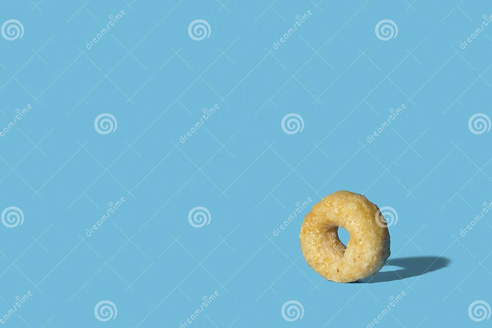 Cheerios Cereal Loop on Blue Background with Copy Space Stock Photo ...