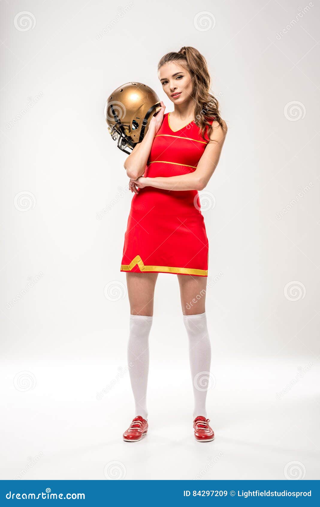 Cheerleader Posing with Helmet Stock Image - Image of equipment, energy ...