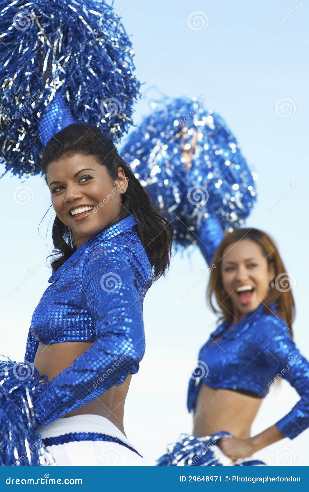 Cheerleaders Cheering in Blue Uniform Stock Image - Image of female ...