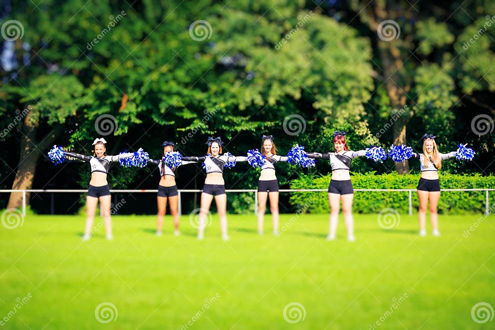 Cheerleaders Practicing Outdoors Stock Photo - Image of cheerleader ...