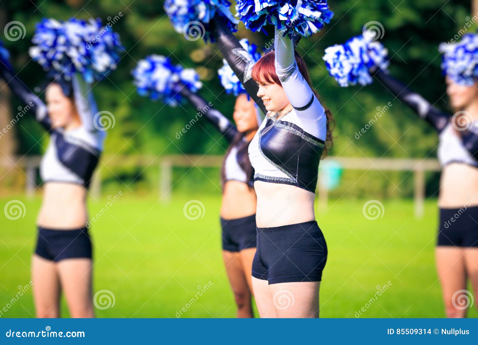 Cheerleaders Practicing stock photo. Image of cheering - 85509314