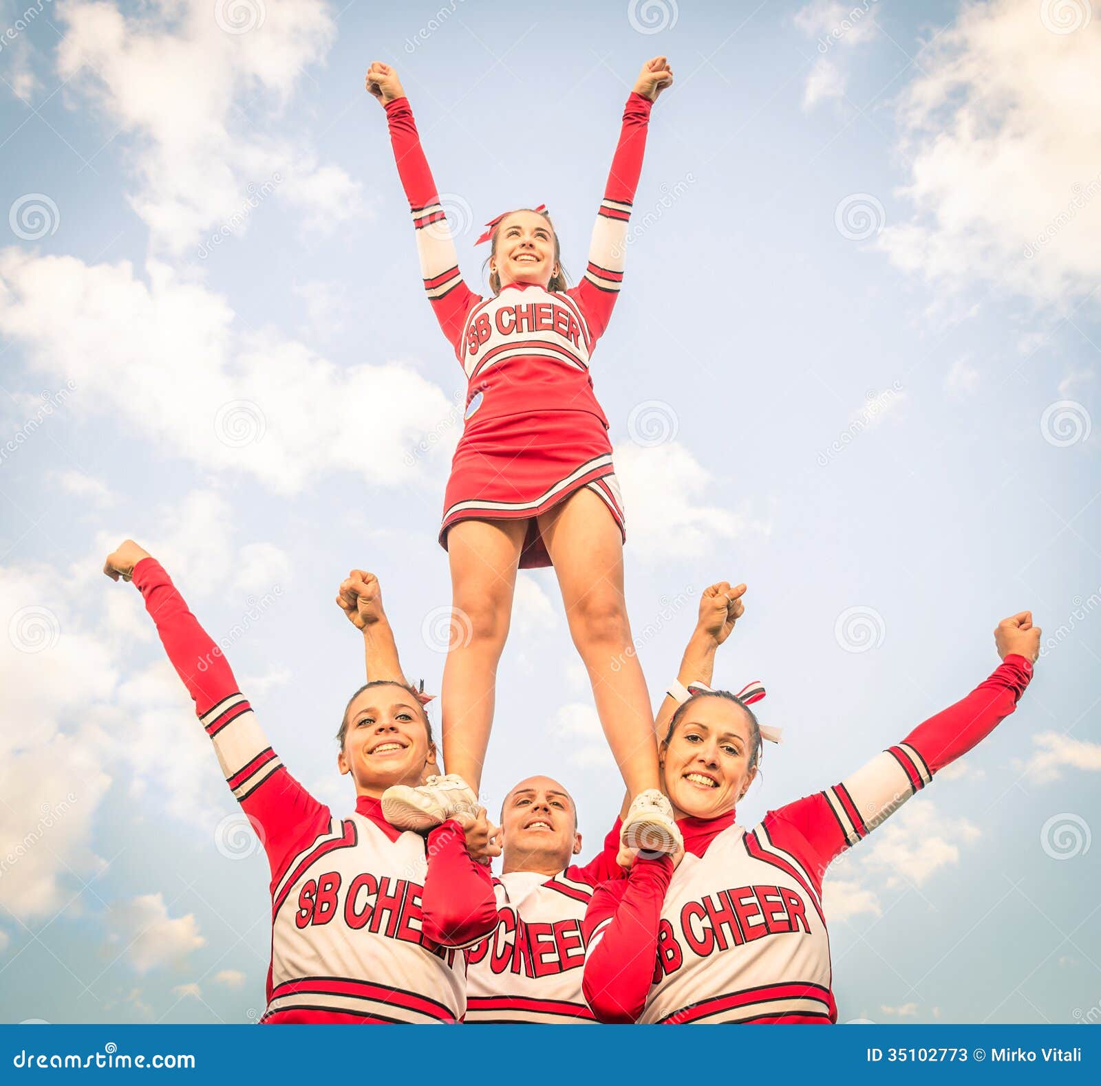 Cheerleaders Team With Male Coach Stock Image Image 35102773