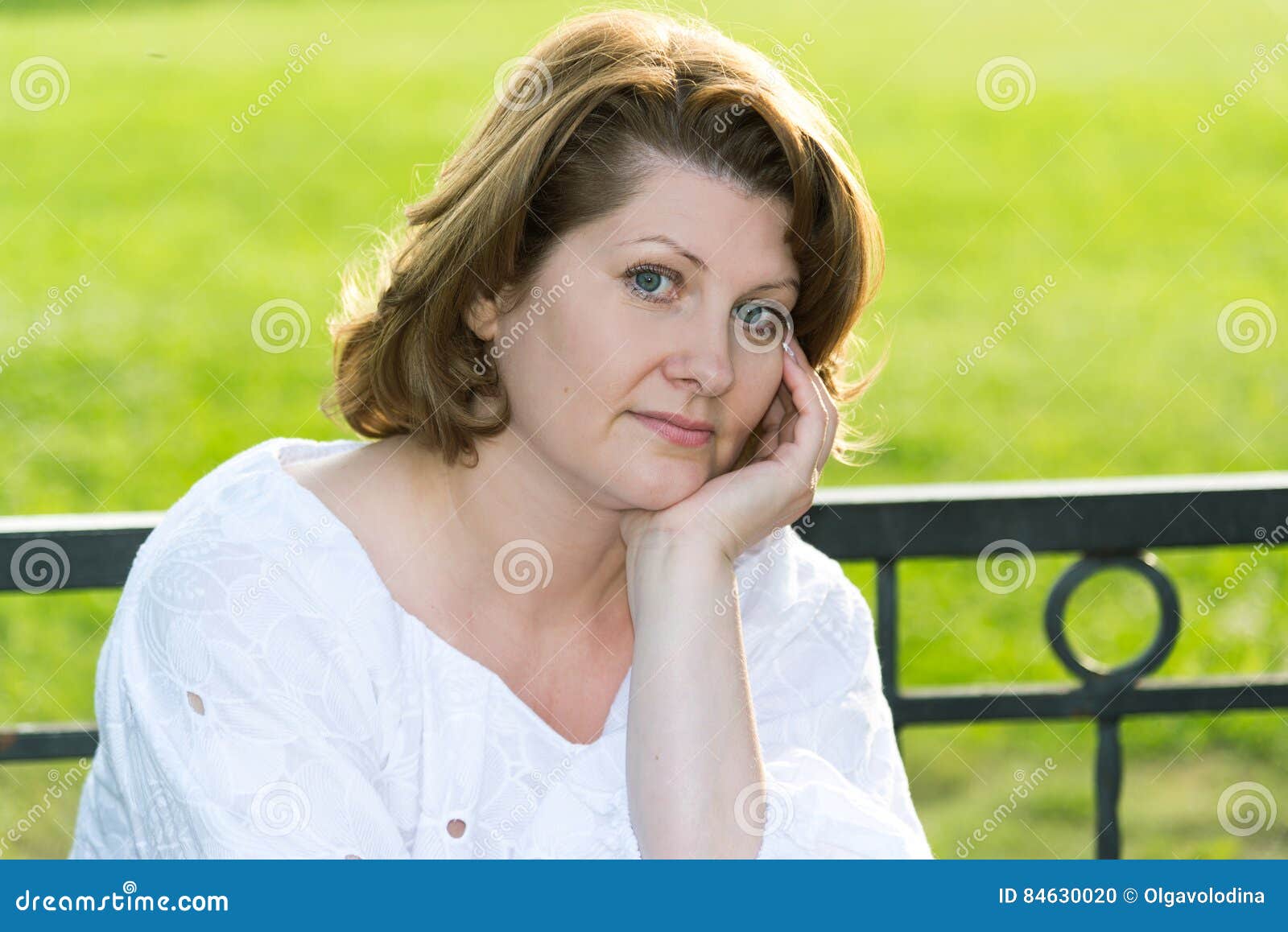 Cheerless Woman in Park on a Bench Stock Photo - Image of positive ...