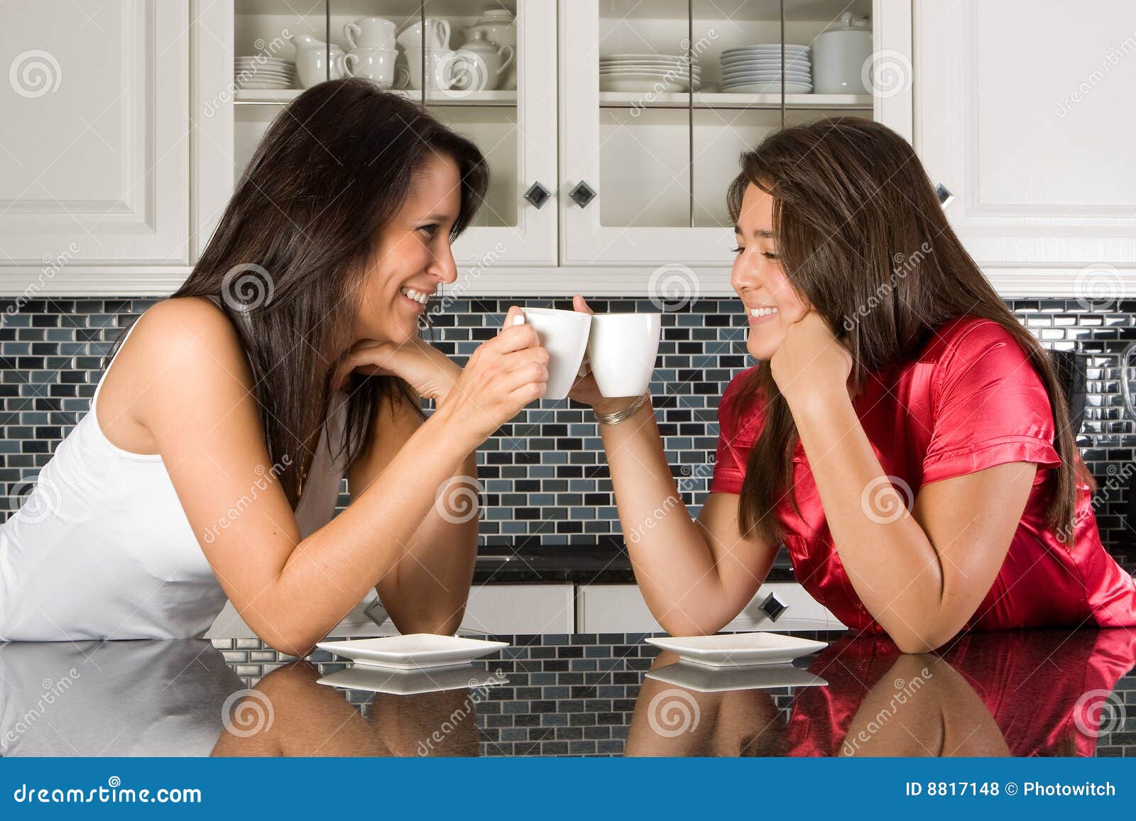 Cheers in the kitchen stock photo. Image of break, white - 8817148