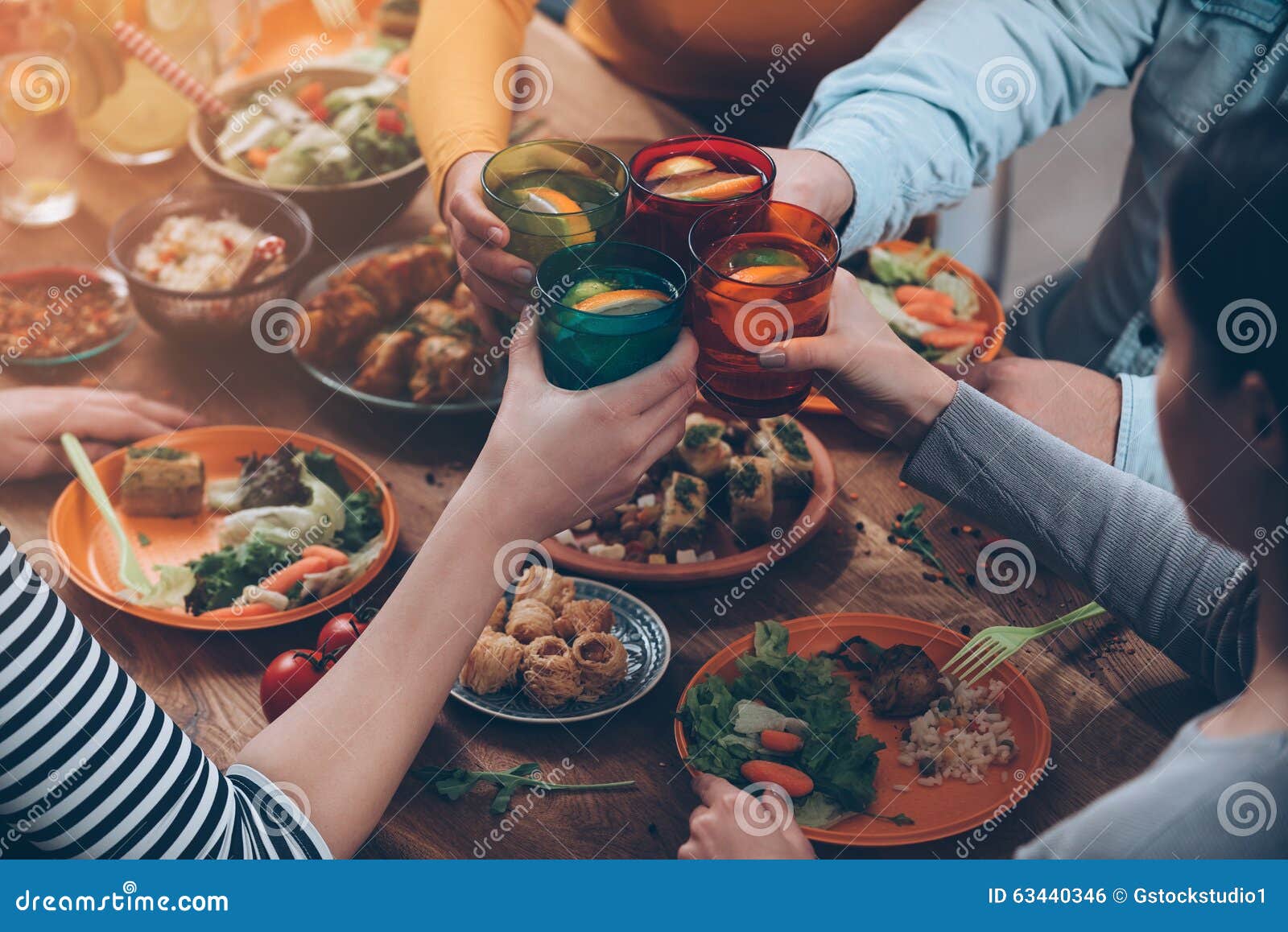 Cheers to us! stock photo. Image of sitting, drink, eating - 63440346
