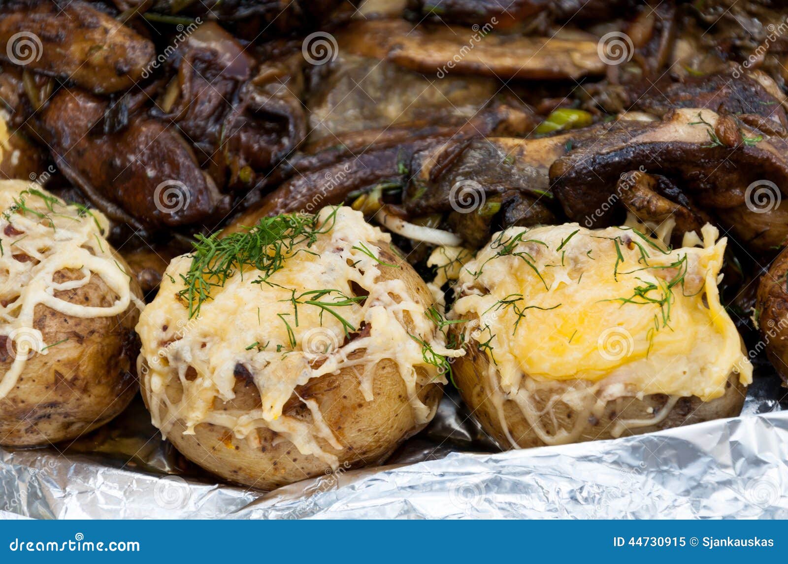 Cheese baked potatoes stock image. Image of cheese, meal - 44730915