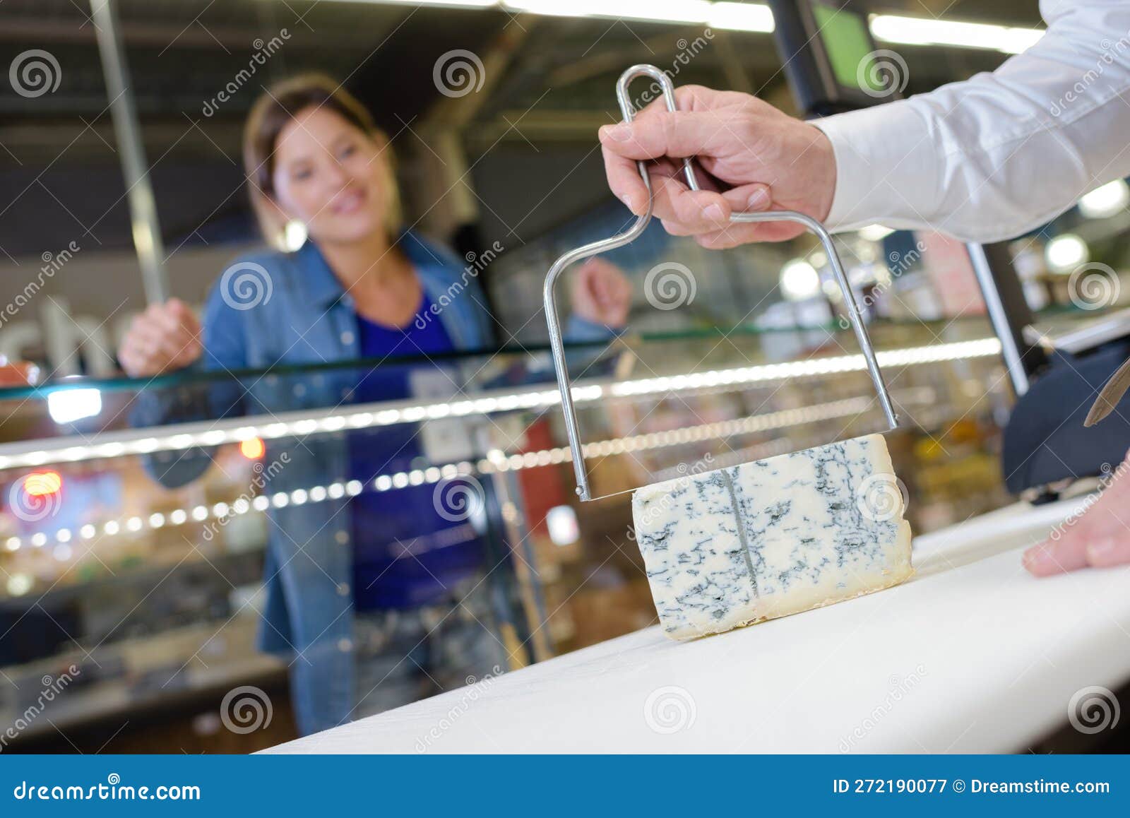 Cheese Being Cut for Customer Stock Image - Image of household, counter ...