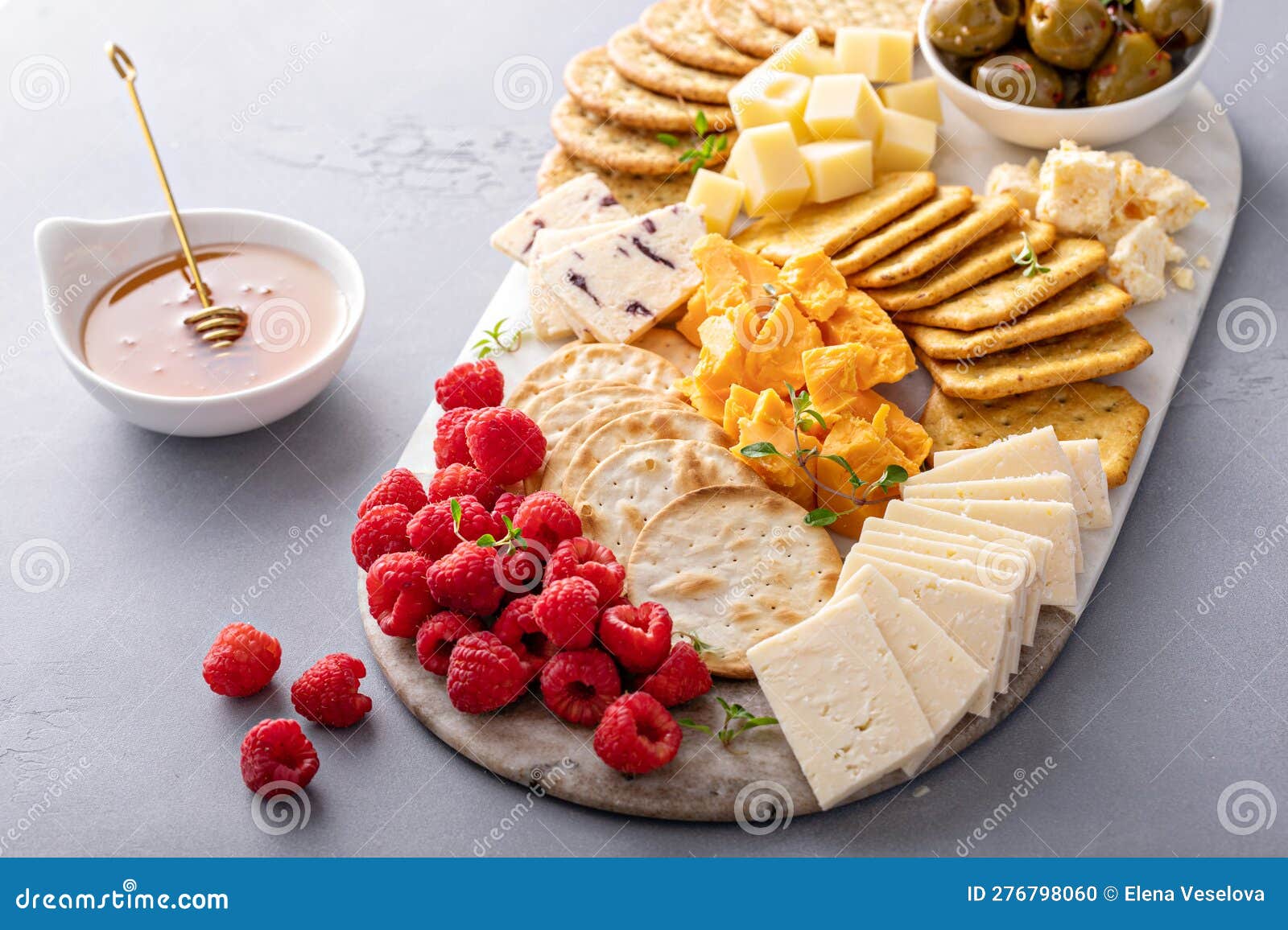 Cheese Board or Snack Board with Crackers, Cheese, Olives and Berries ...
