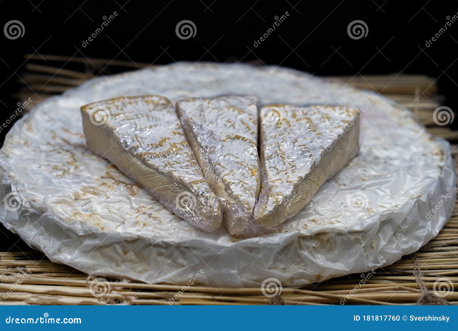 Cheese Brie with Triangle Pieces Out Placed on Top. Cheese Brie Stock ...