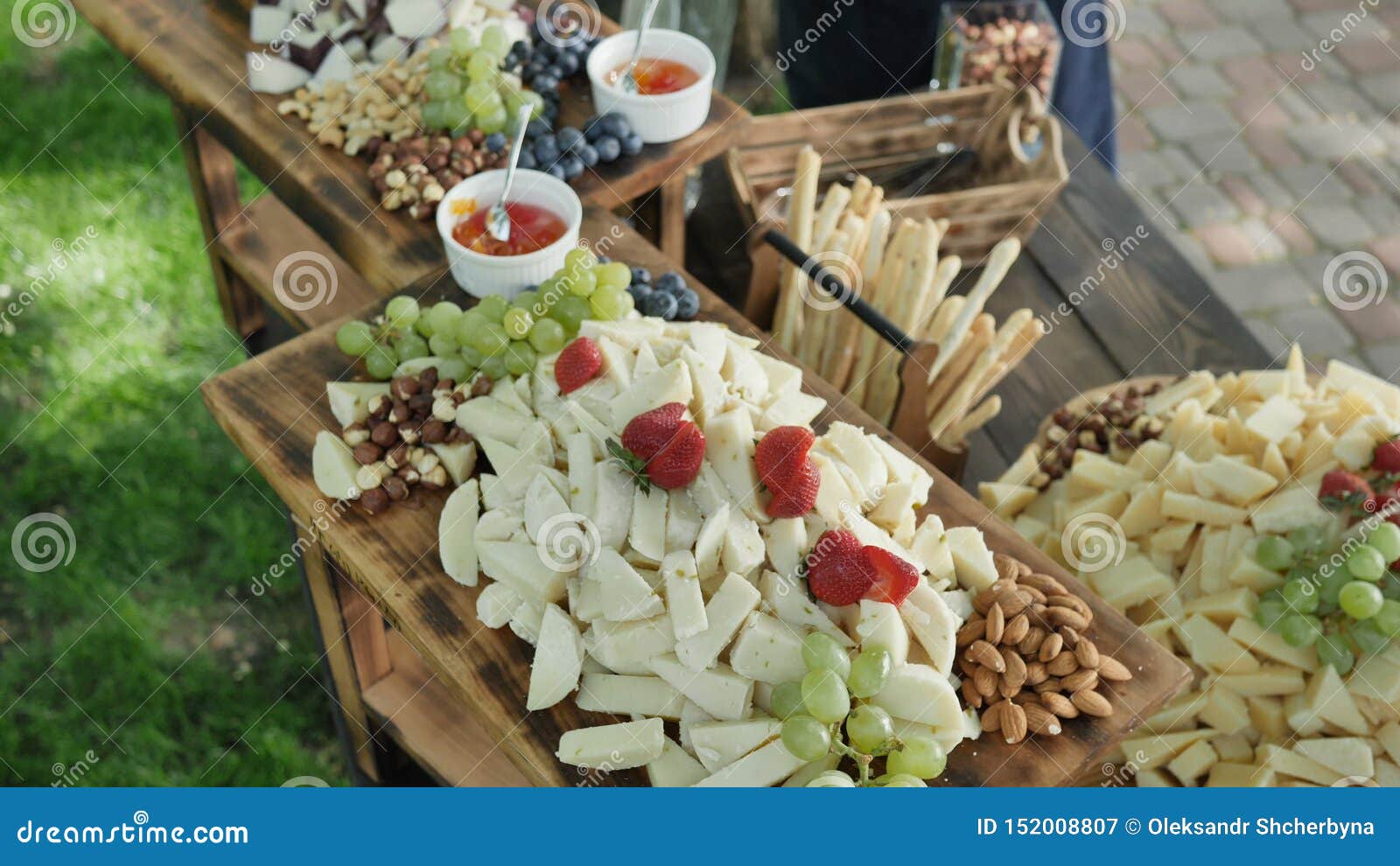 Cheese Cheder Gouda Parmesan and Fruit Berries Bread Sticks and Nuts ...