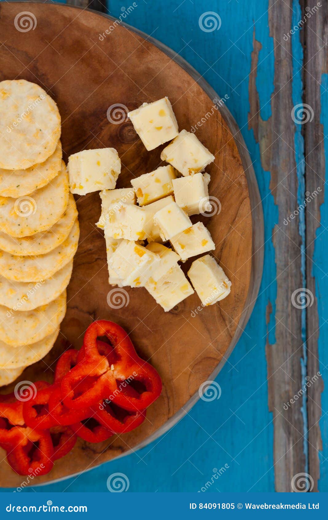 Cheese Cubes, Capsicum and Biscuits on Wooden Board Stock Image - Image ...