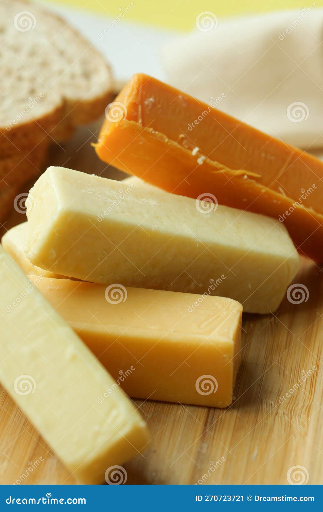 Cheese Cubes Green, Yellow and Red Color on Chopping Board Stock Image ...