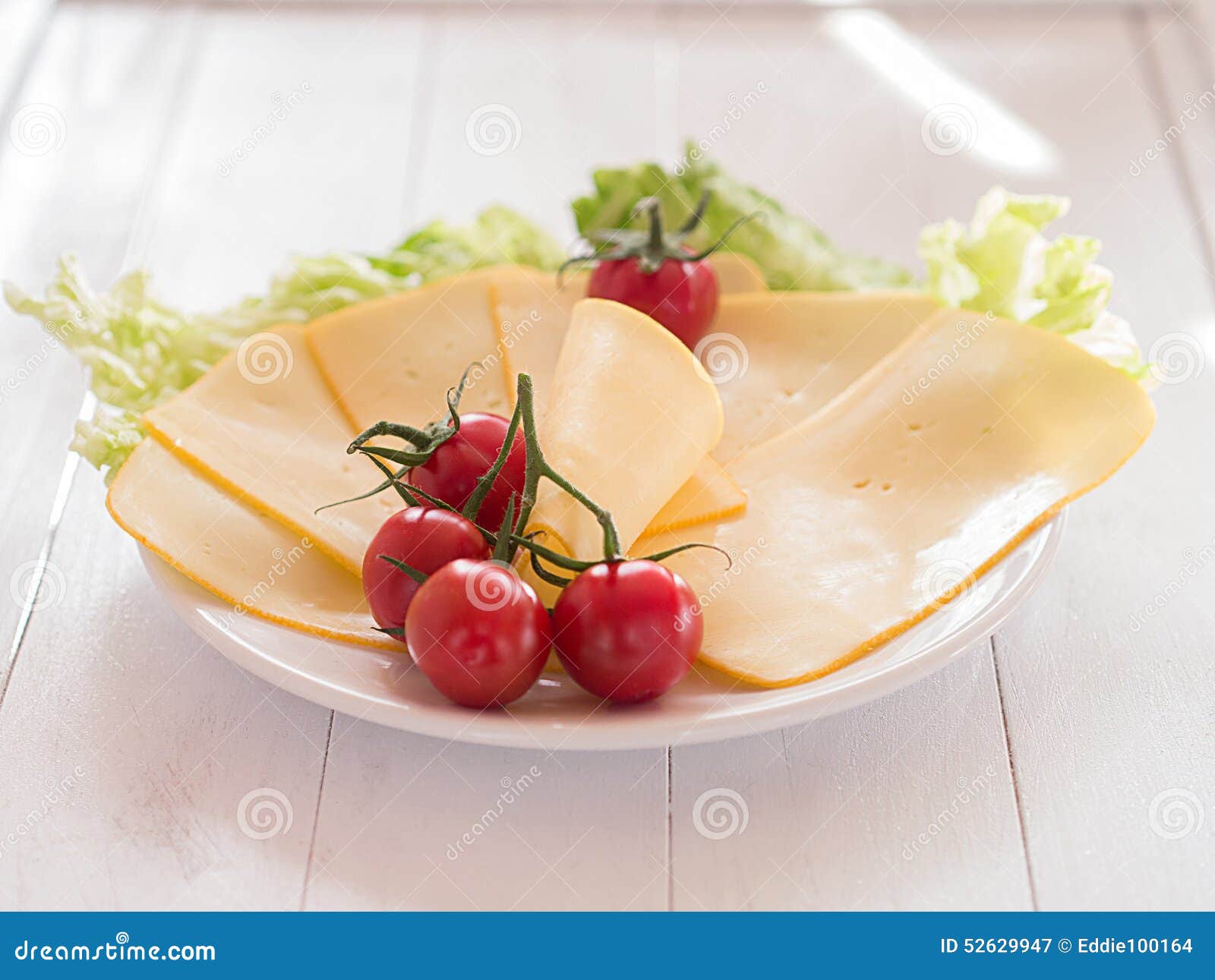 Cheese in Discs Cut on a Plate Stock Image - Image of basic, cows: 52629947