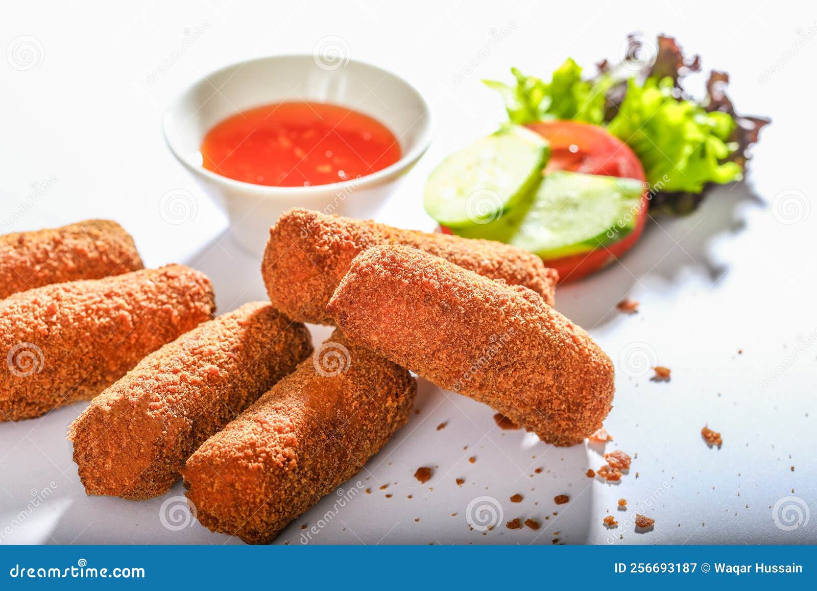 CHEESE FINGERS with Sauce and Salad Served in a Dish Side View on Grey ...