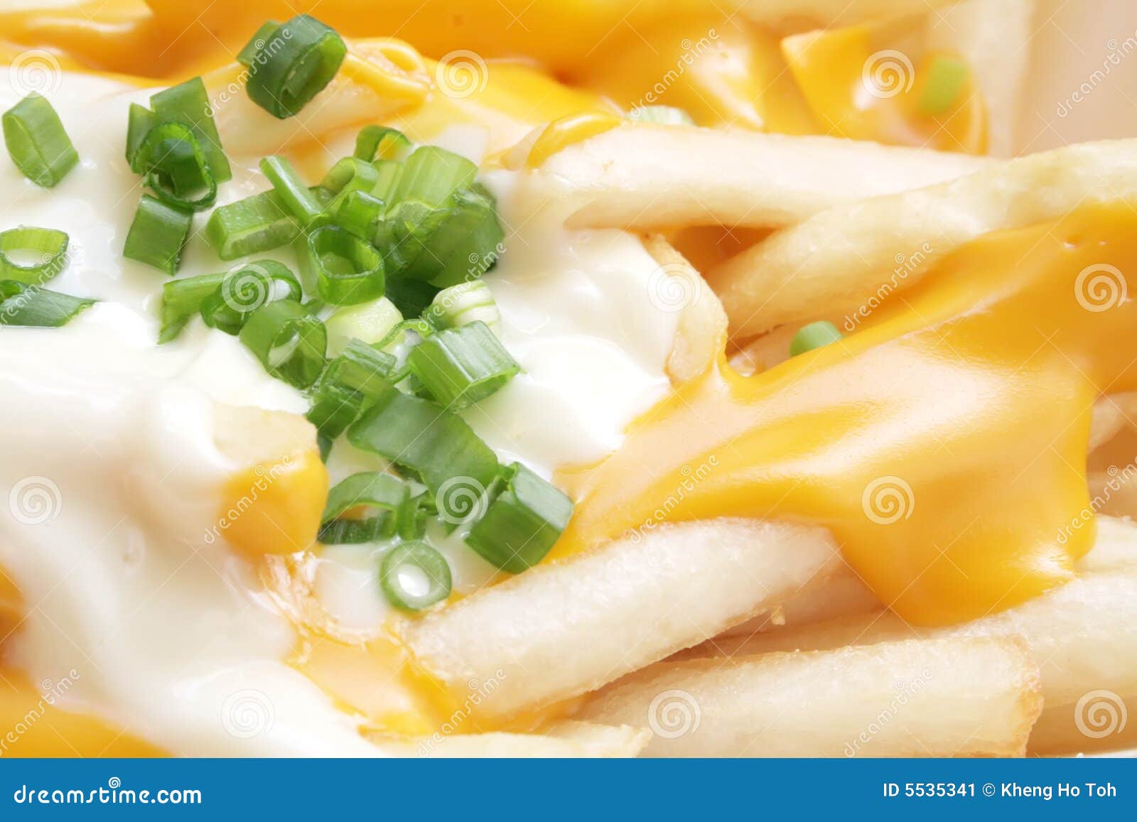 Cheese Fries Drizzle Loaded Or Potato Chips With Cheddar Cheese In ...