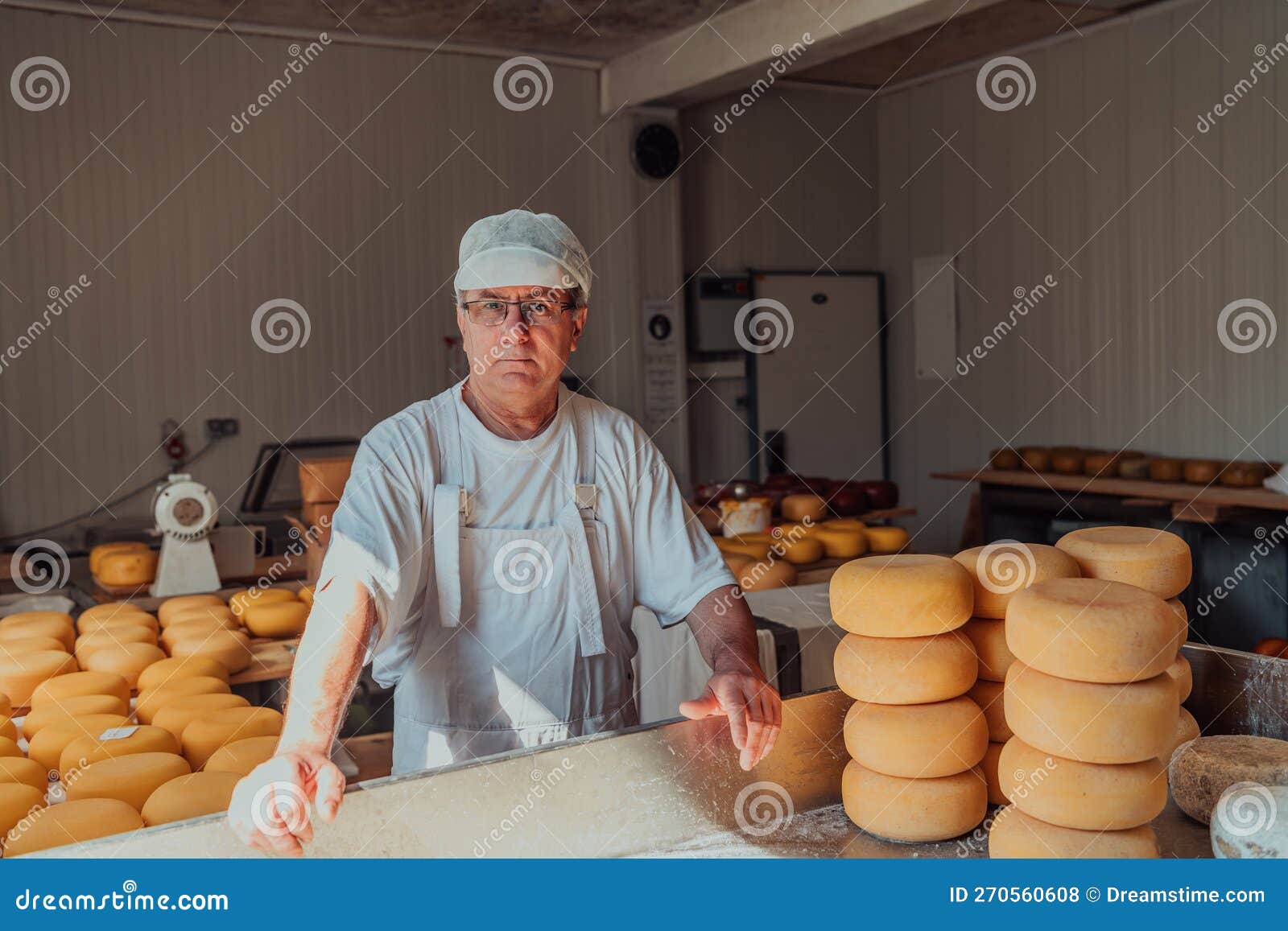 The Cheese Maker Sorting Freshly Processed Pieces of Cheese and ...