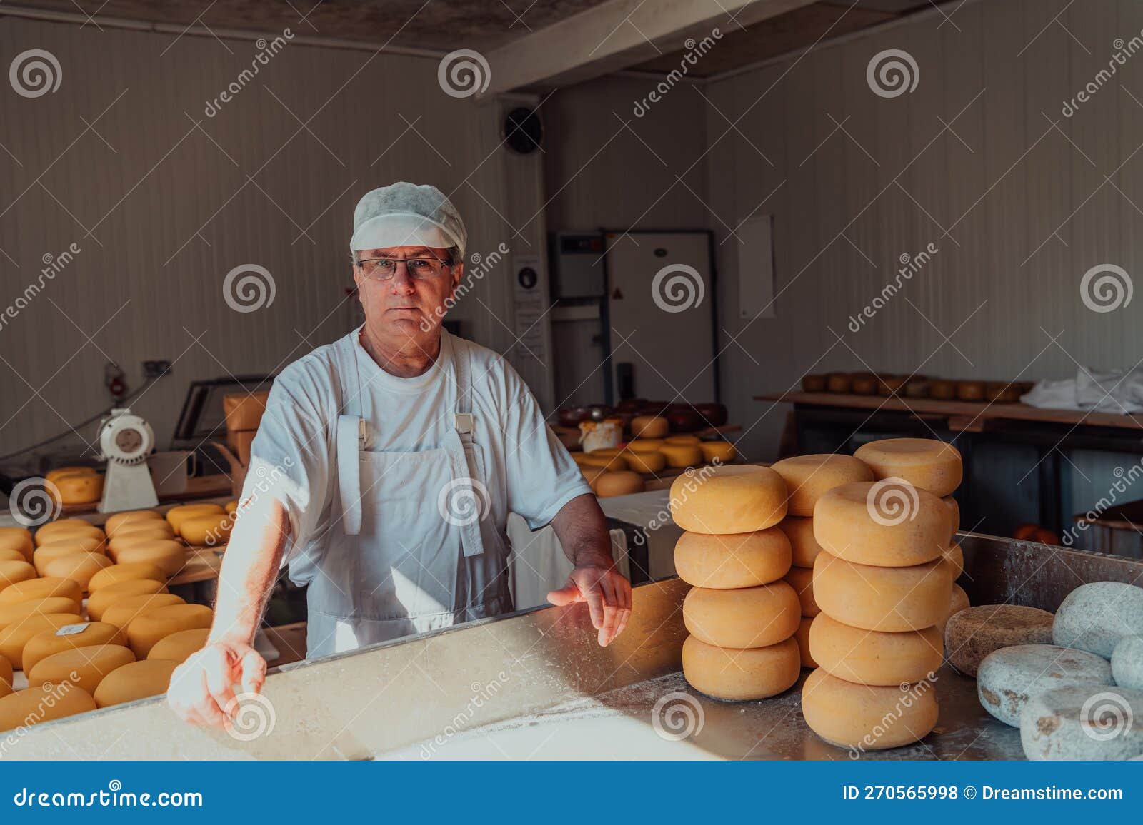 The Cheese Maker Sorting Freshly Processed Pieces of Cheese and ...