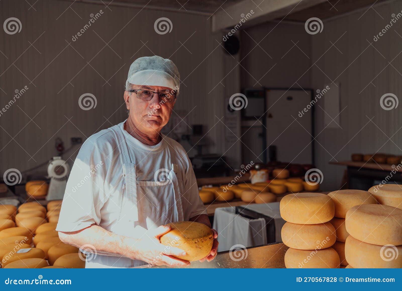 The Cheese Maker Sorting Freshly Processed Pieces of Cheese and ...