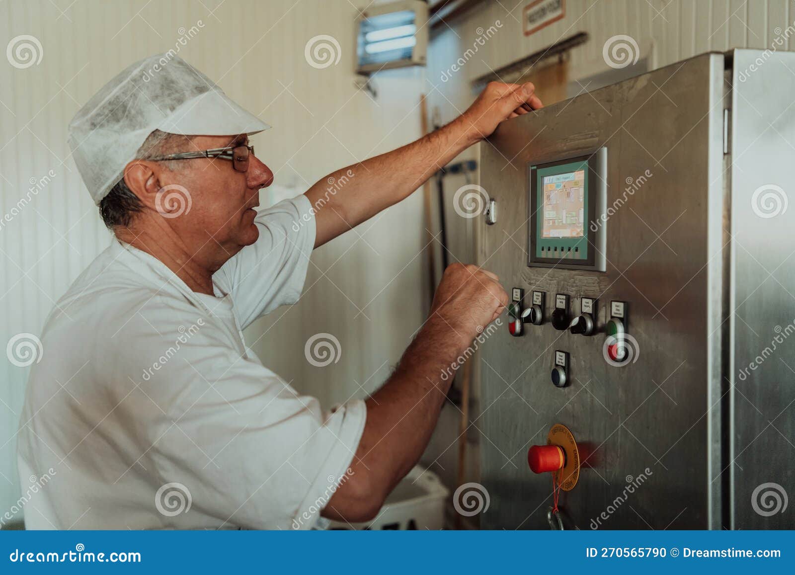 Cheese Maker Working in the Modern Industry on Machines that are Using ...