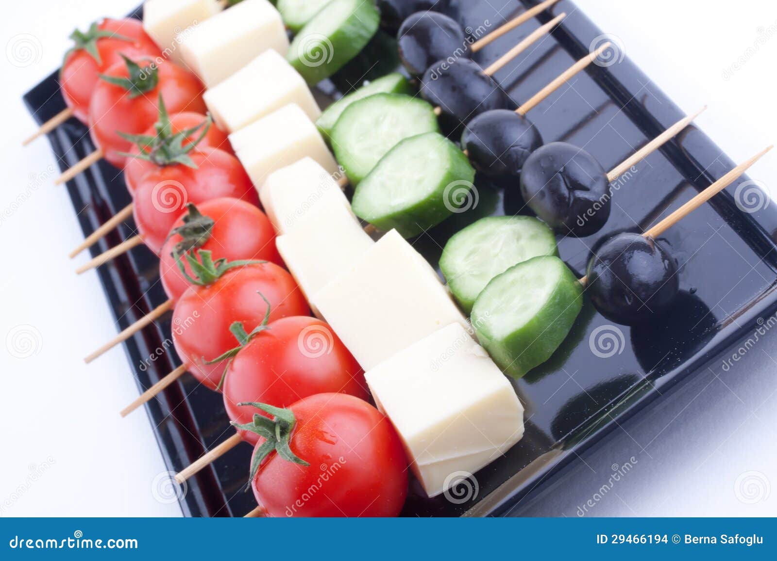 Cheese and Olive Canapes with Tomato and Cucumber Stock Photo - Image ...