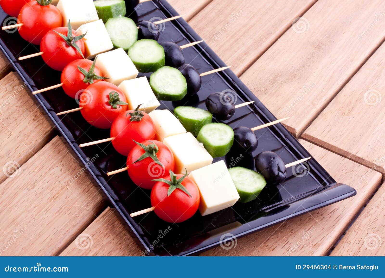 Cheese and Olive Canapes with Tomato and Cucumber Stock Photo - Image ...