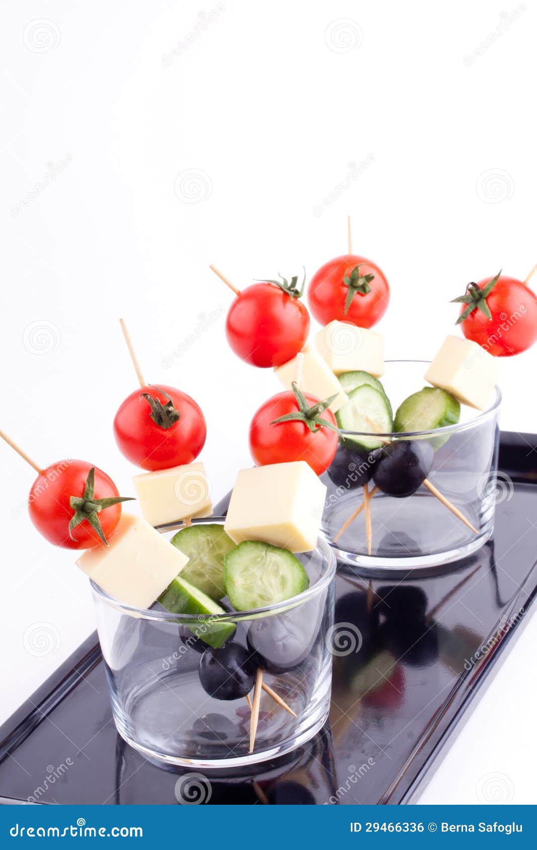 Cheese and Olive Canapes with Tomato and Cucumber Stock Photo - Image ...