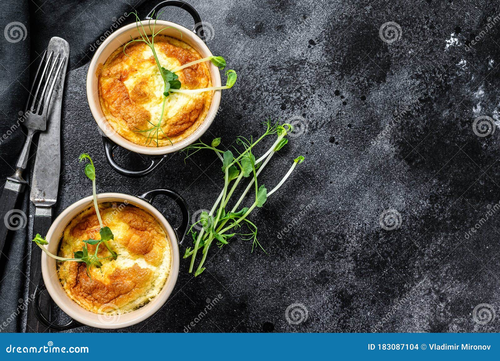 Cheese Omelette , Omelet with Microgreens in a Pan. Black Background ...