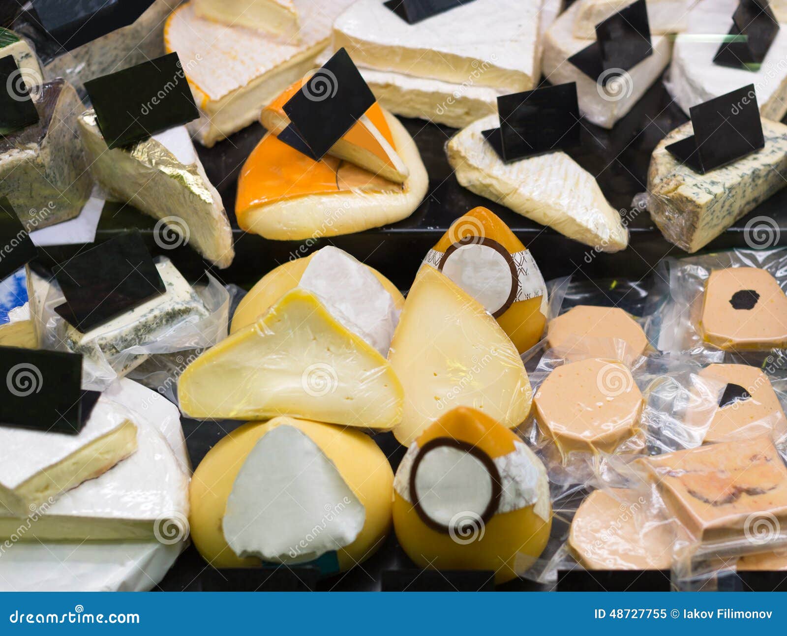 Cheese in Packs and in Bulk on Counter Stock Image - Image of fermer ...