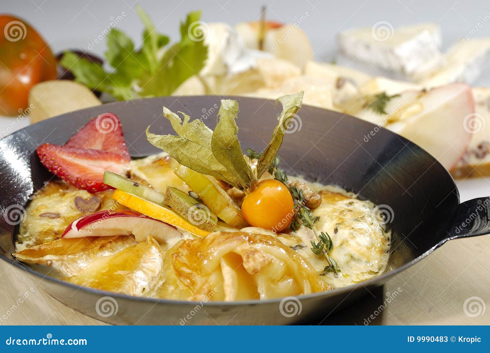 Cheese pan stock image. Image of kiwi, cherries, physalis - 9990483